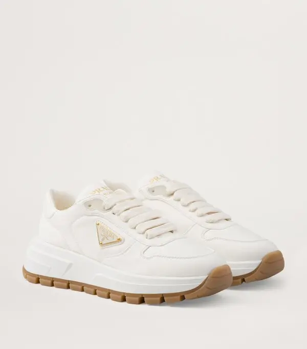 Prada Leather Triangle Sneakers - Neutral