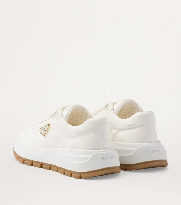 Prada Leather Triangle Sneakers - Neutral