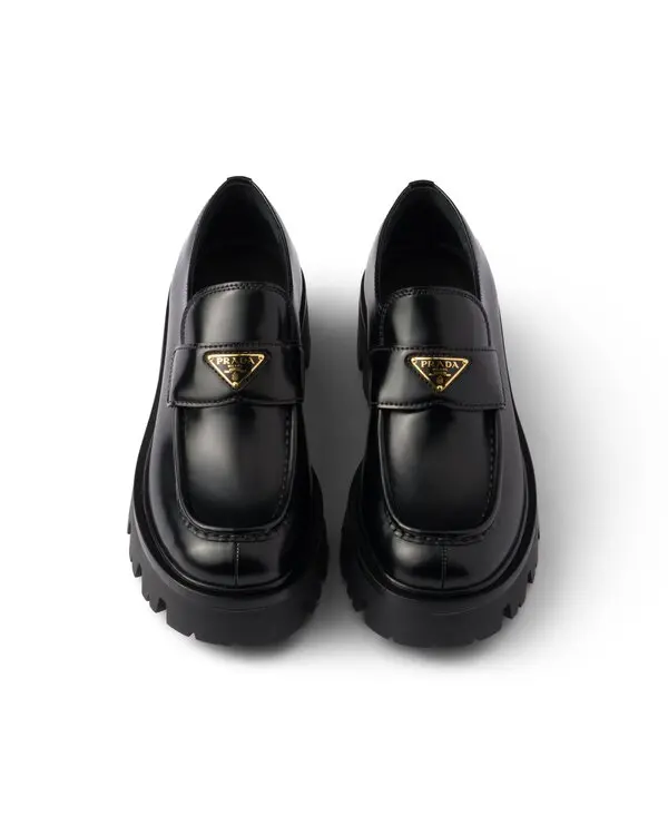 Prada Brushed Leather Loafers With Enameled Triangle Logo - Black