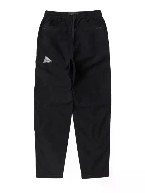 AND WANDER Pleated Belted Trousers