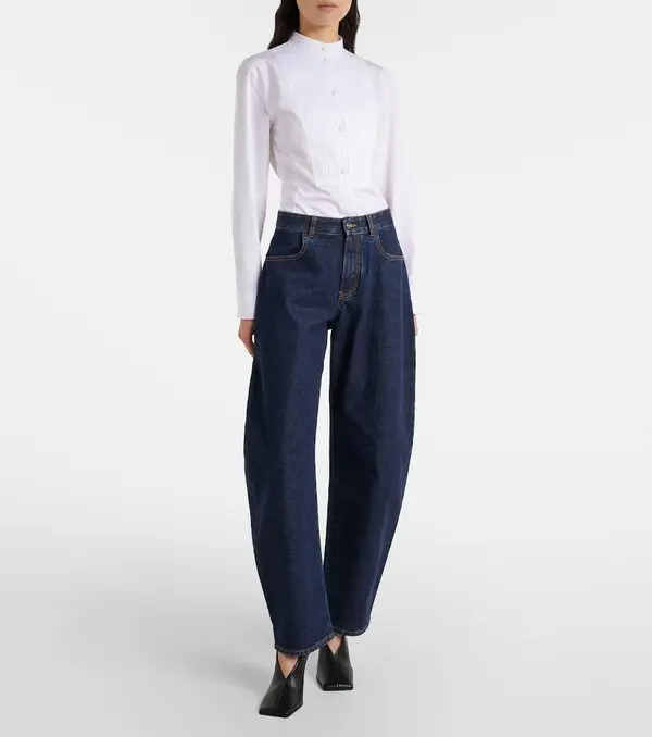 Alaïa Mid-rise Barrel-leg Jeans In Dock