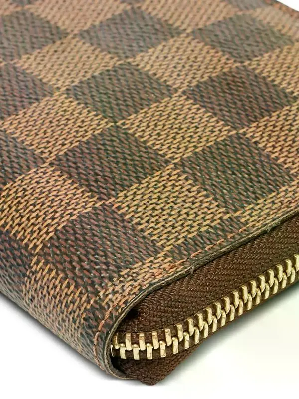 LOUIS VUITTON 2010 Damier Ebene Zip-around Wallet - Brown