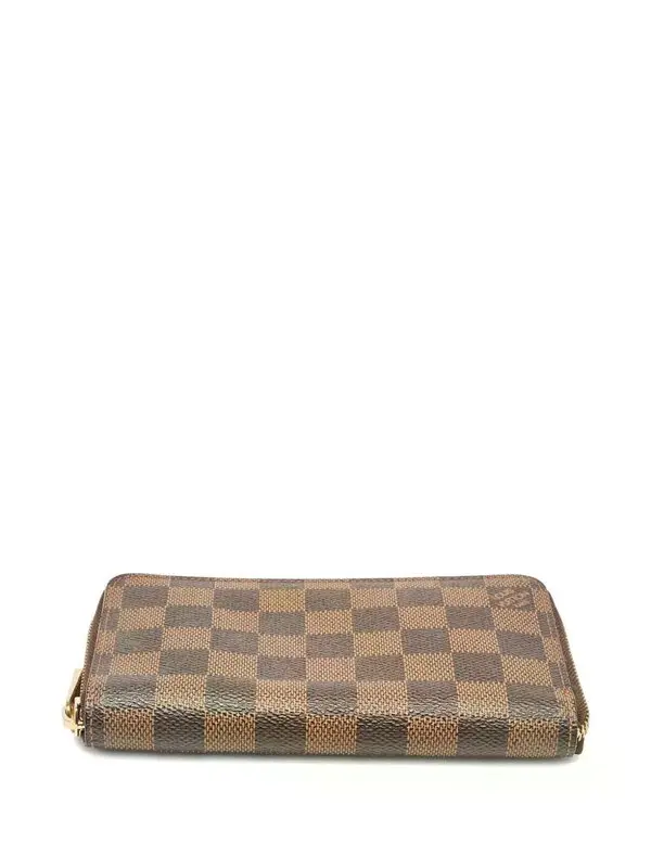 LOUIS VUITTON 2010 Damier Ebene Zip-around Wallet - Brown