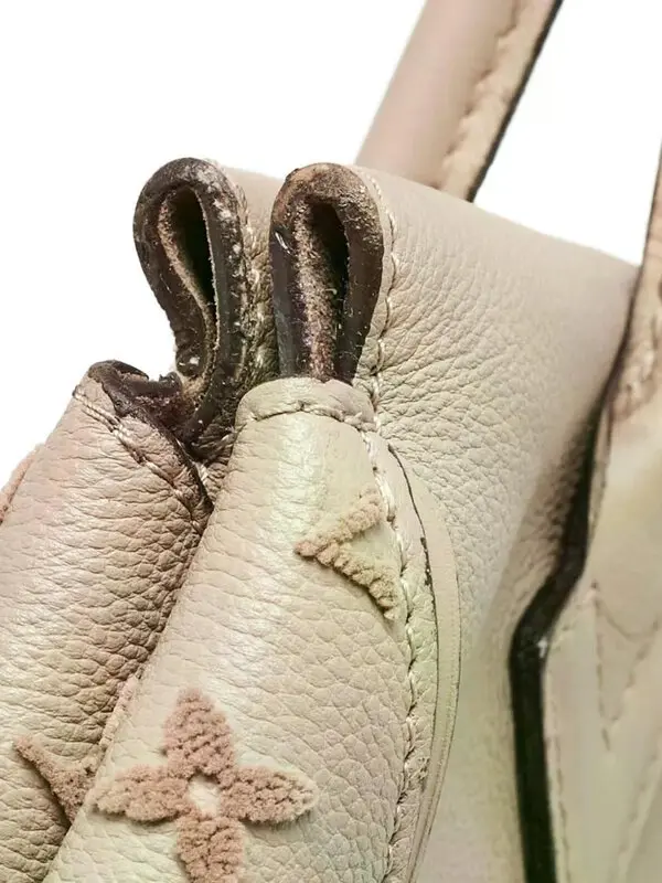 LOUIS VUITTON Monogram-embossed Leather Handbag