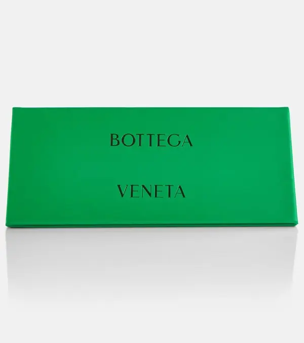 Bottega Veneta Oval Sunglasses With Gold Tone Detail - Black