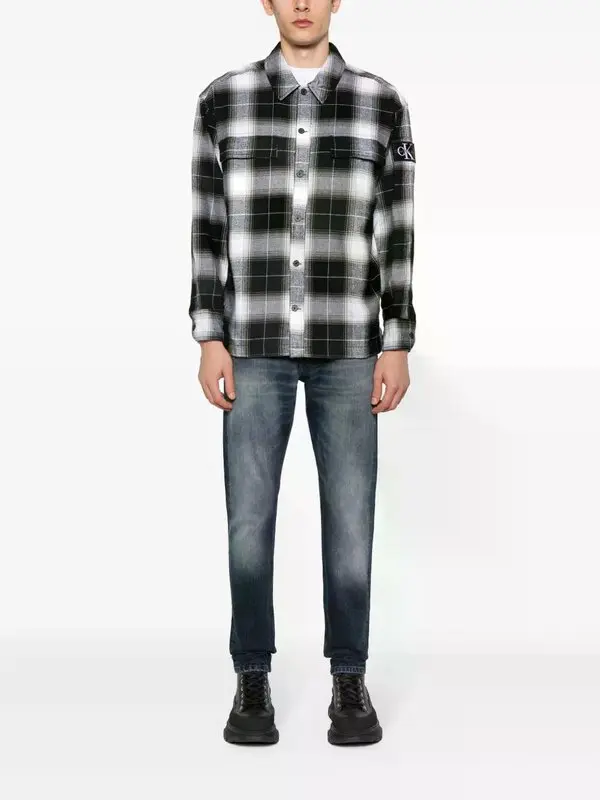 Calvin Klein Mid-rise Tapered-leg Jeans - Blue