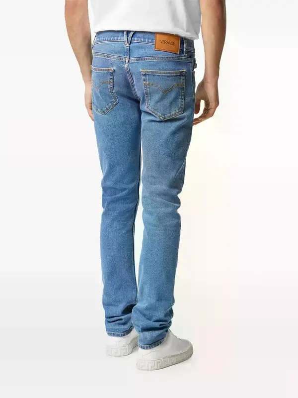 Versace Medusa Head-embellished Mid-rise Slim-fit Jeans - Blue