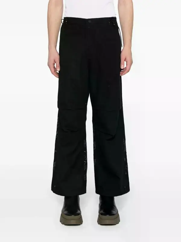 MAHARISHI Straight-leg Trousers With Graphic Print