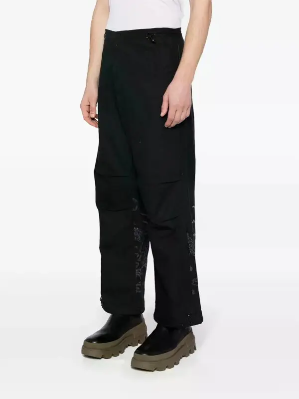 MAHARISHI Straight-leg Trousers With Graphic Print