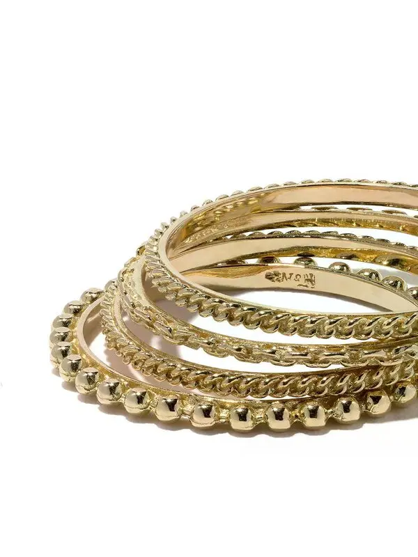 WOUTERS & HENDRIX 18kt Gold Four Ring Set With Chain Texture