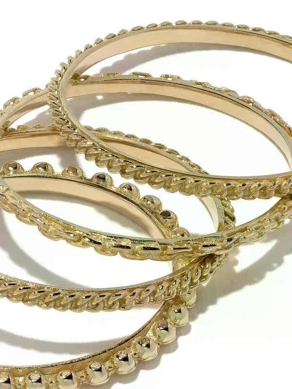 WOUTERS & HENDRIX 18kt Gold Four Ring Set With Chain Texture