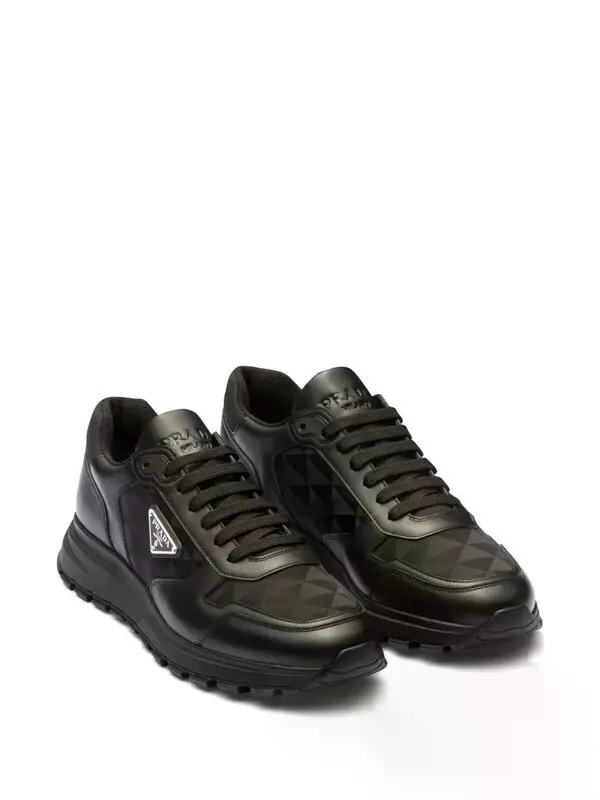 Prada Geometric Panel Leather And Nylon Lace-up Sneakers - Black