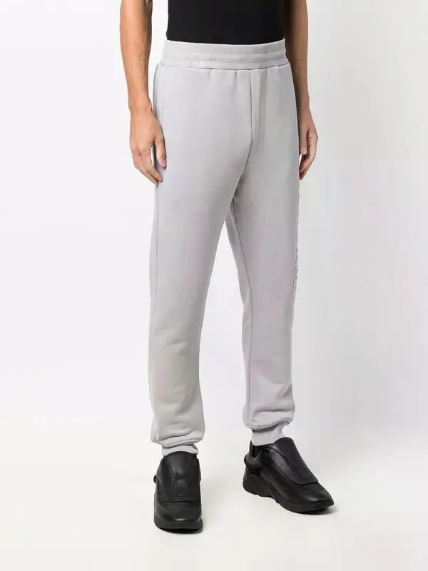 A-COLD-WALL* Embossed Logo Trackpants - Grey