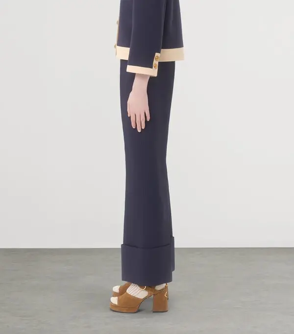 Valentino Garavani Wool-silk Flared Trousers With Turned-up Cuffs