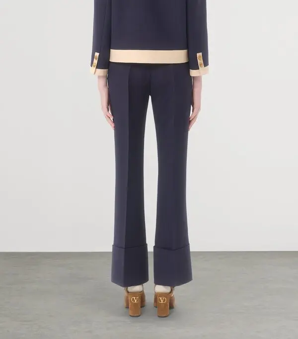 Valentino Garavani Wool-silk Flared Trousers With Turned-up Cuffs