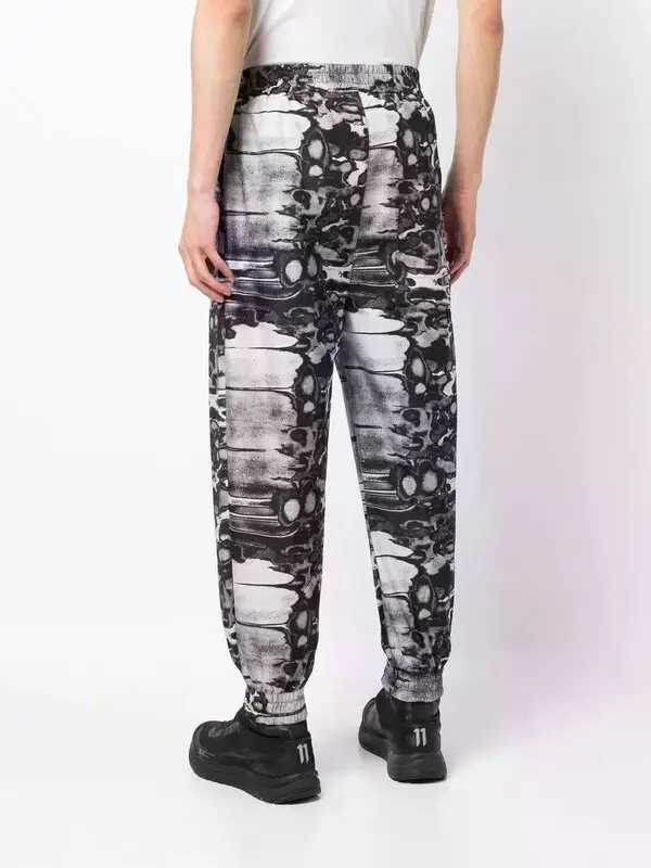 ISO.POETISM Khumbu Abstract-print Track Pants