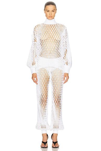 Alaïa Long Sleeve Open Knit Turtleneck Top