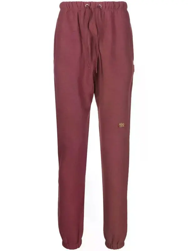 ADVISORY BOARD CRYSTALS Logo-patch Track Pants - Red