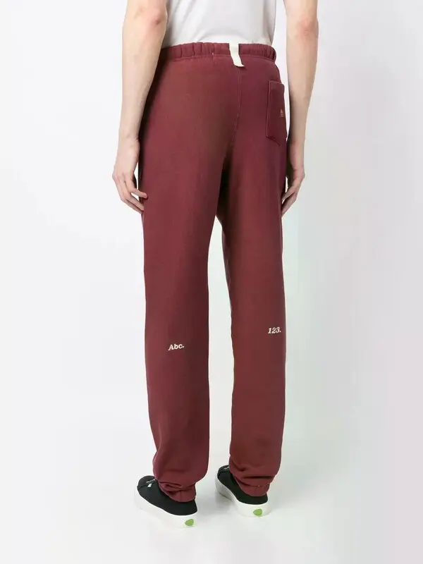 ADVISORY BOARD CRYSTALS Logo-patch Track Pants - Red