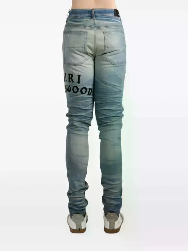 Amiri Distressed Embroidered Jeans