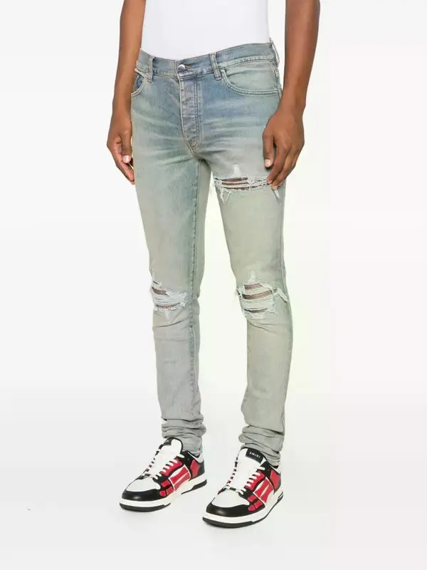 Amiri Leather-trimmed Denim Jeans