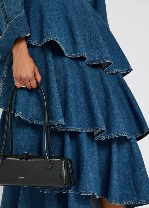 Alaïa Spiral Asymmetric Tiered Denim Midi Skirt