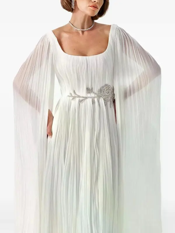 ANA RADU Pleated Maxi Dress With Cape Sleeves And Rose Embellishment