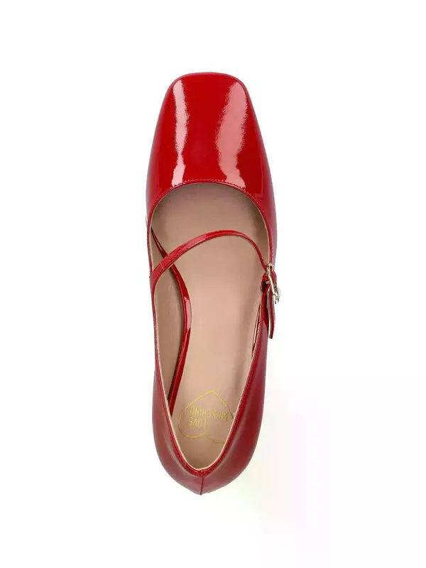 Moschino Patent Buckle Pumps