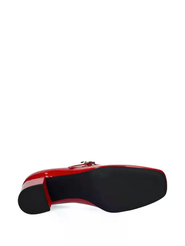 Moschino Patent Buckle Pumps