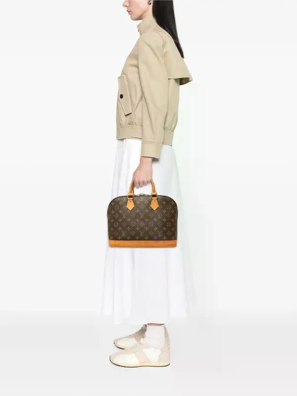 LOUIS VUITTON 2001 Monogram Alma Pm Handbag
