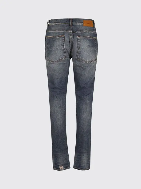 Amiri Slim Fit Distressed Denim Jeans With Worn Effect And Five-pocket Design