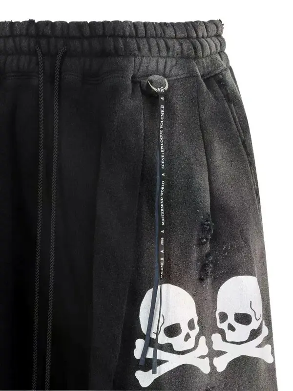 MASTERMIND WORLD Distressed Graphic-print Track Pants