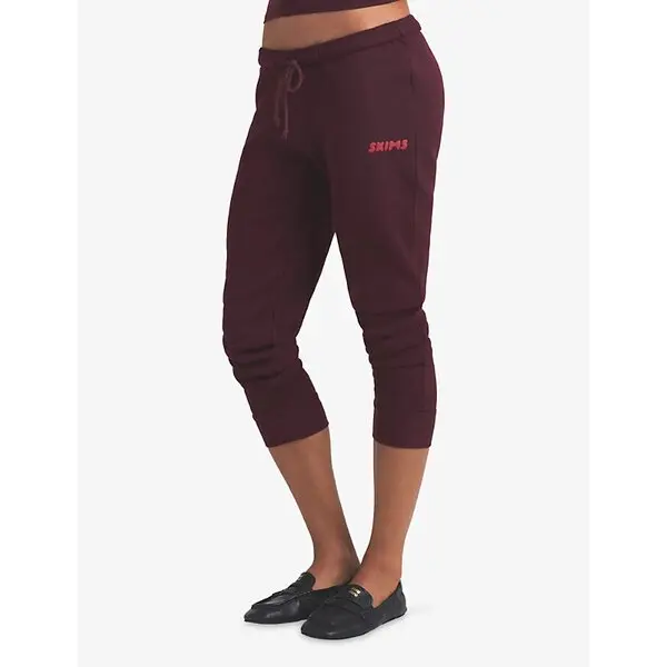 SKIMS Cotton Fleece Embossed-logo Leggings - Currant
