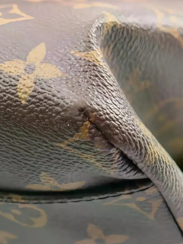 LOUIS VUITTON Monogram Leather Travel Bag