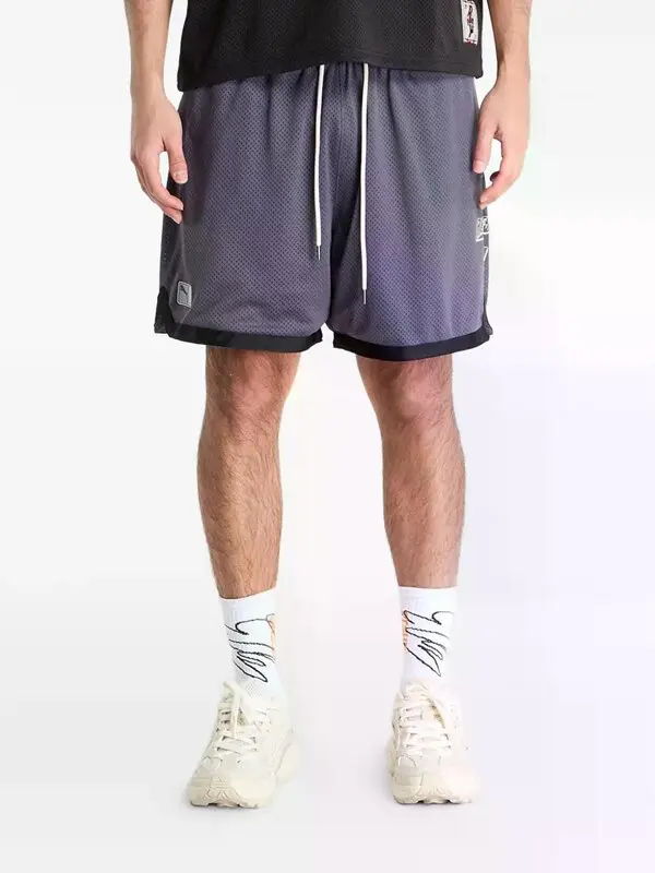 PUMA Relaxed Fit Drawstring Shorts With Graphic Detail