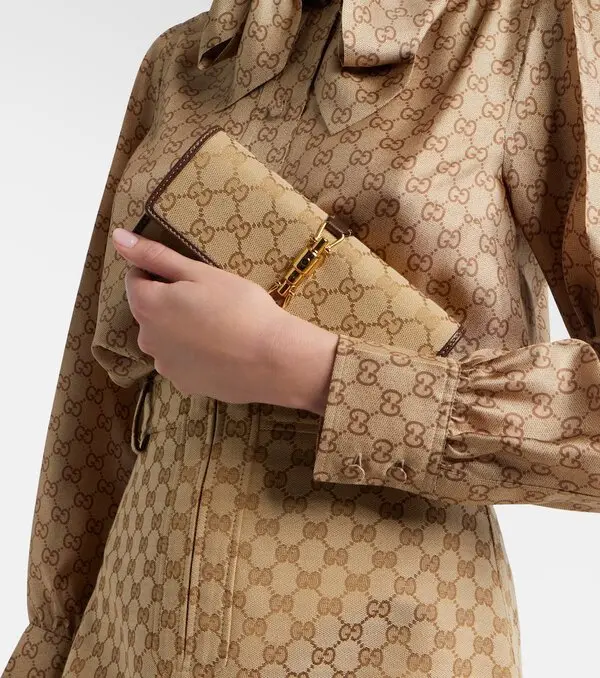 Gucci Jackie Gg Canvas Clutch