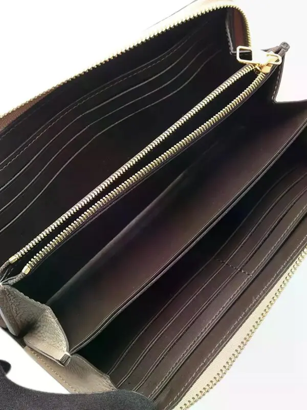 LOUIS VUITTON 2021-2025 Taurillon Comete Wallet Long Wallets - Brown