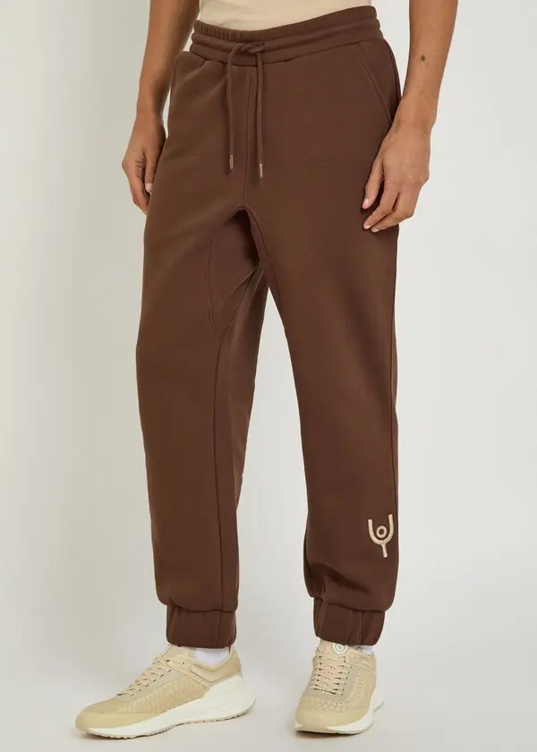 NOW YOU LIVE Magna Logo-embroidered Cotton-blend Sweatpants