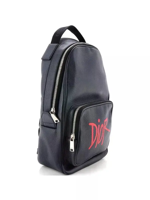 Dior Zip Around Sling Logo Printed Leather Backpack