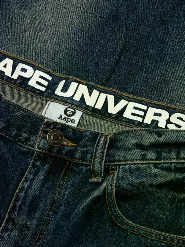 AAPE BY *A BATHING APE Distressed Paint Splatter Denim Trousers