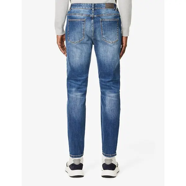 ARNE Five-pocket Tapered-leg Stretch-denim Jeans