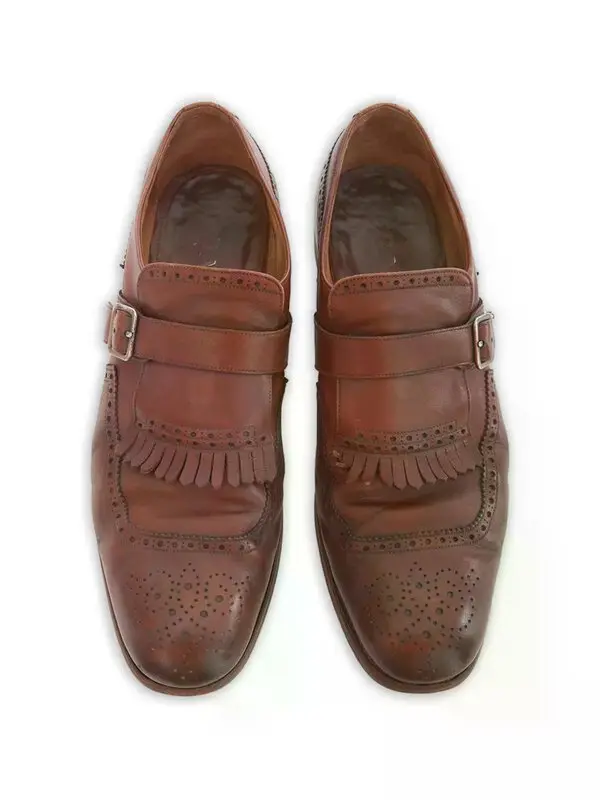 Prada Buckled Tassel Loafers