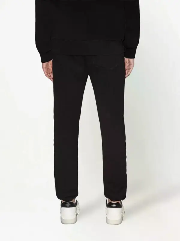 Amiri Logo-motif Organic Cotton Track Pants - Black
