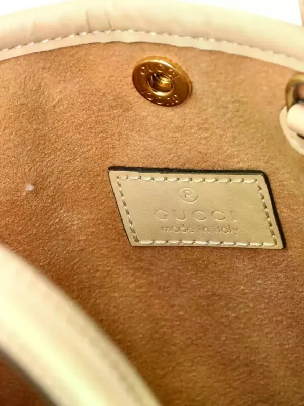 Gucci Vertical Gg Embossed Leather Mini Tote Bag