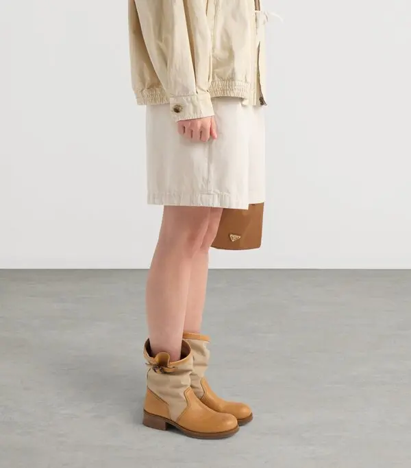 Prada Mid-calf Buckled Leather And Canvas Boots