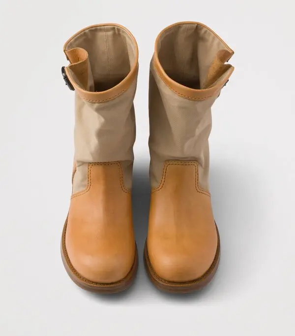 Prada Mid-calf Buckled Leather And Canvas Boots