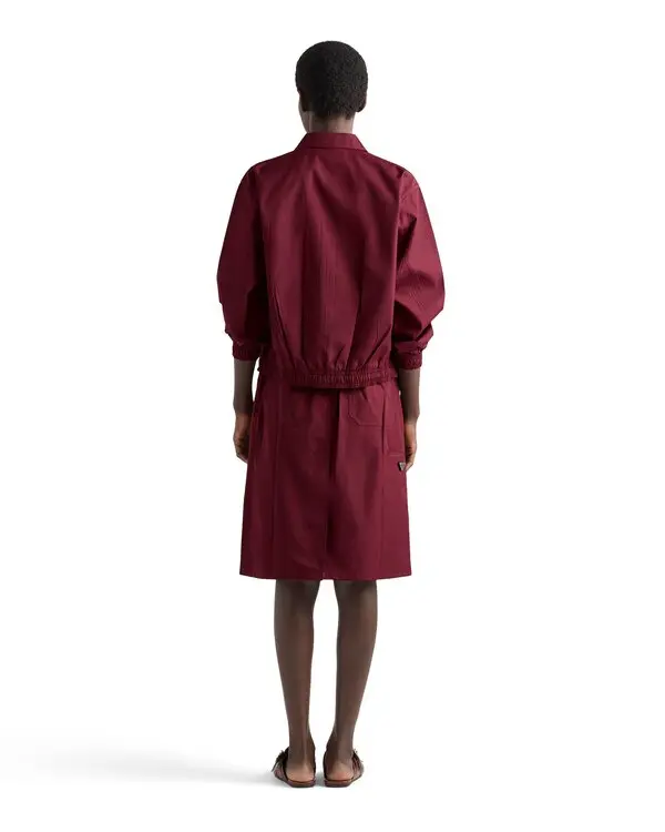 Prada Midi Skirt With Enameled Triangle Logo