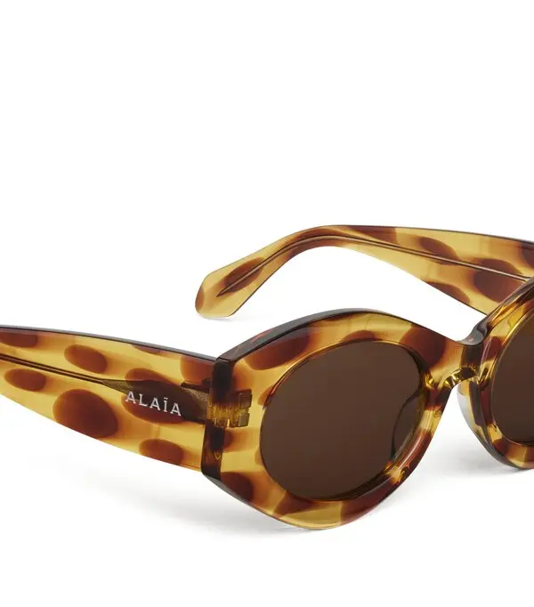 Alaïa Acetate Speckled Oval Sunglasses
