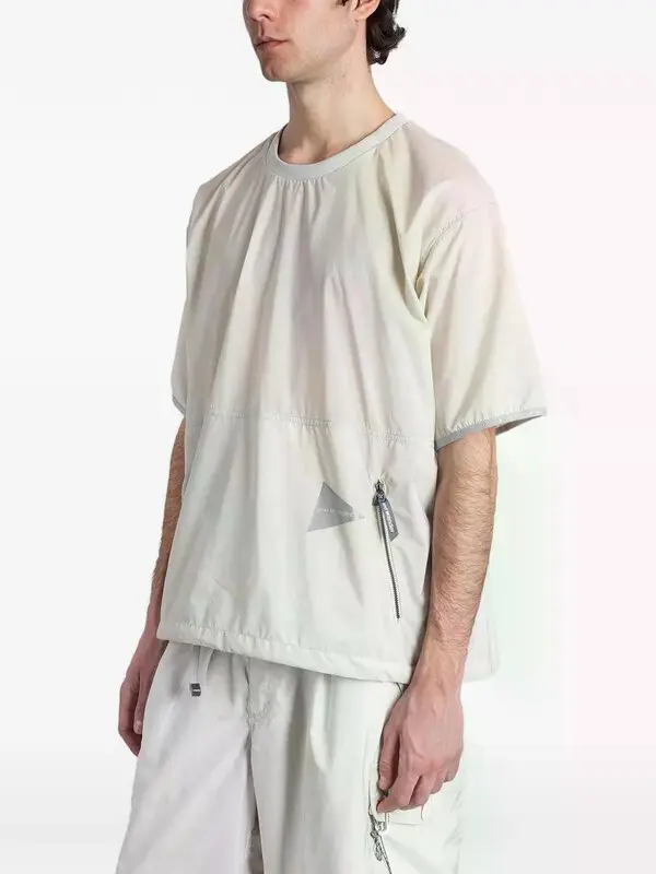 AND WANDER Pertex Quantum Air Logo-print Zip-pocket T-shirt