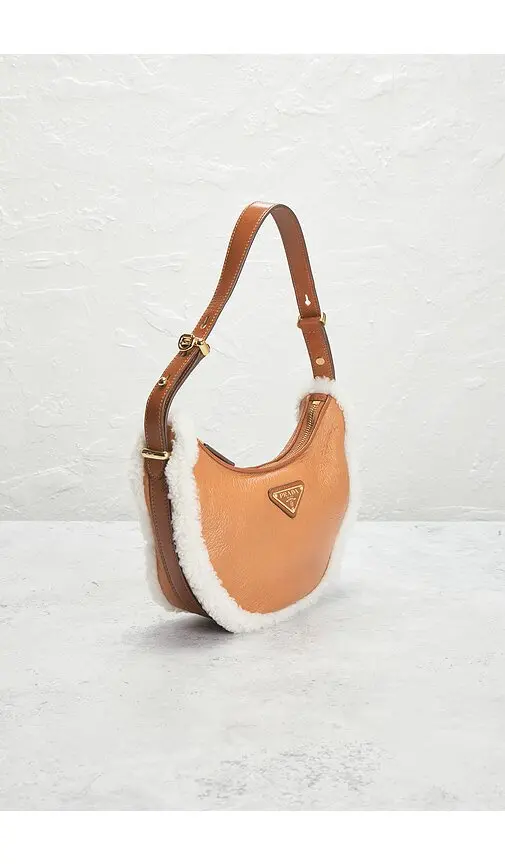 FWRD RENEW Prada Shearling Arque Shoulder Bag